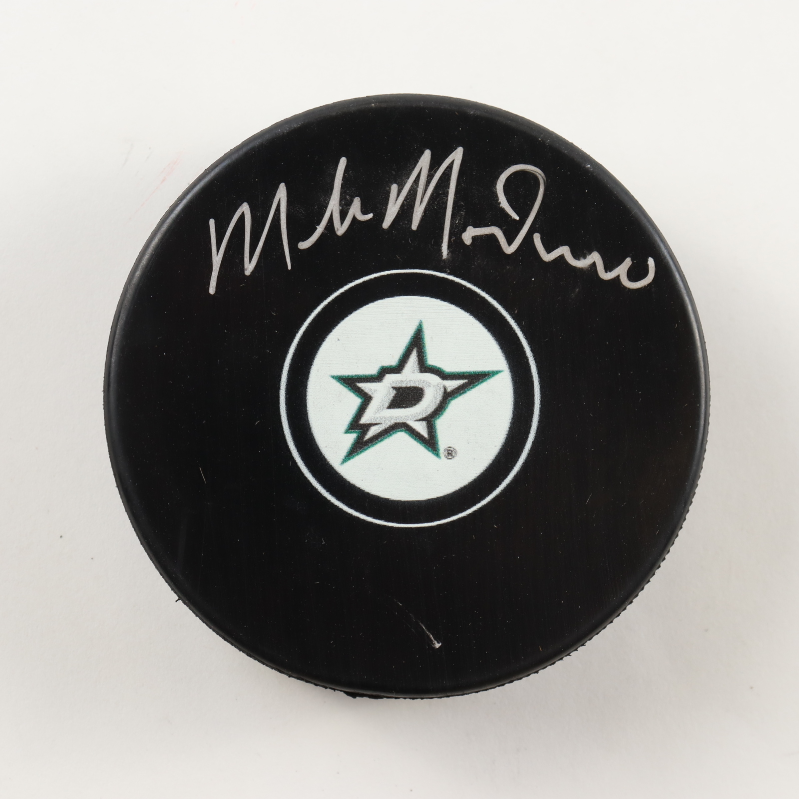Mike Modano Signed Stars Logo Hockey Puck (Players Ink) | Pristine Auction