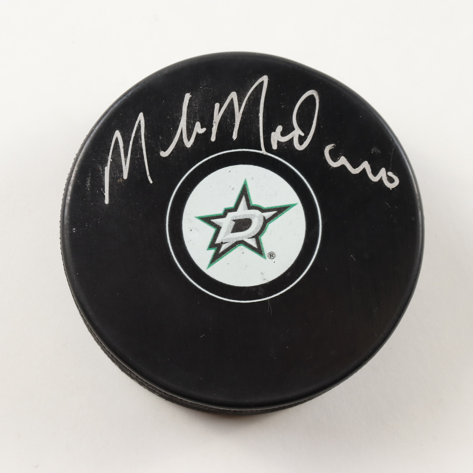 Mike Modano Signed Stars Logo Hockey Puck (Players Ink) | Pristine Auction