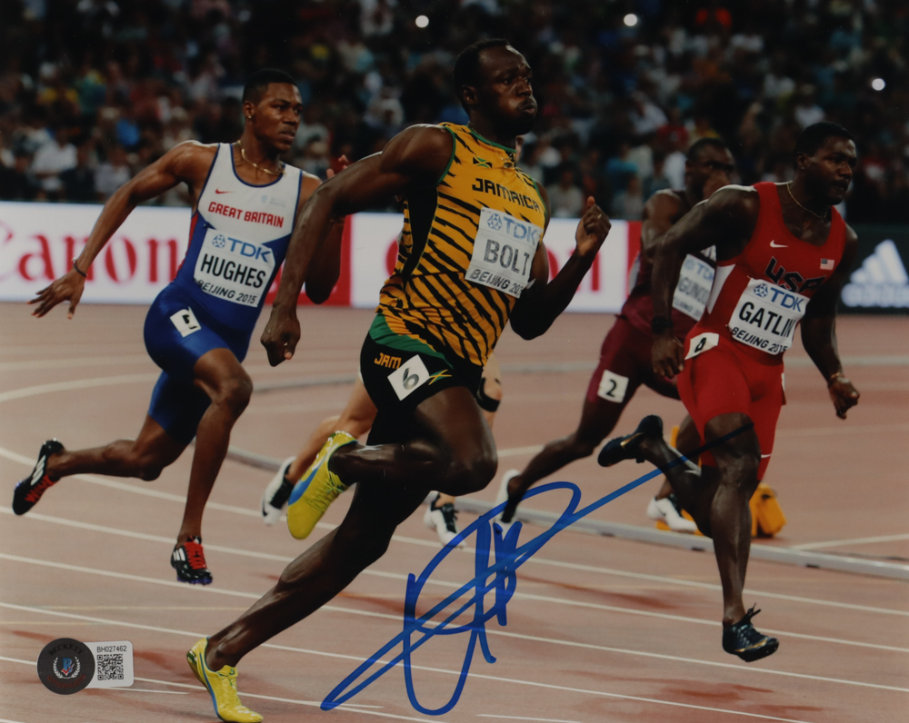 Usain Bolt Signed Team Jamaica 8x10 Photo (Beckett) | Pristine Auction