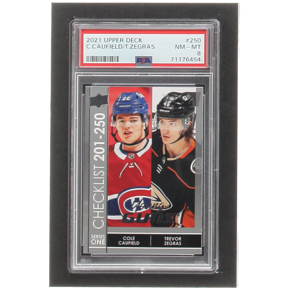 Cole Caufield / Trevor Zegras 2021-22 Upper Deck #250 YG CL RC (PSA 8) | Pristine Auction