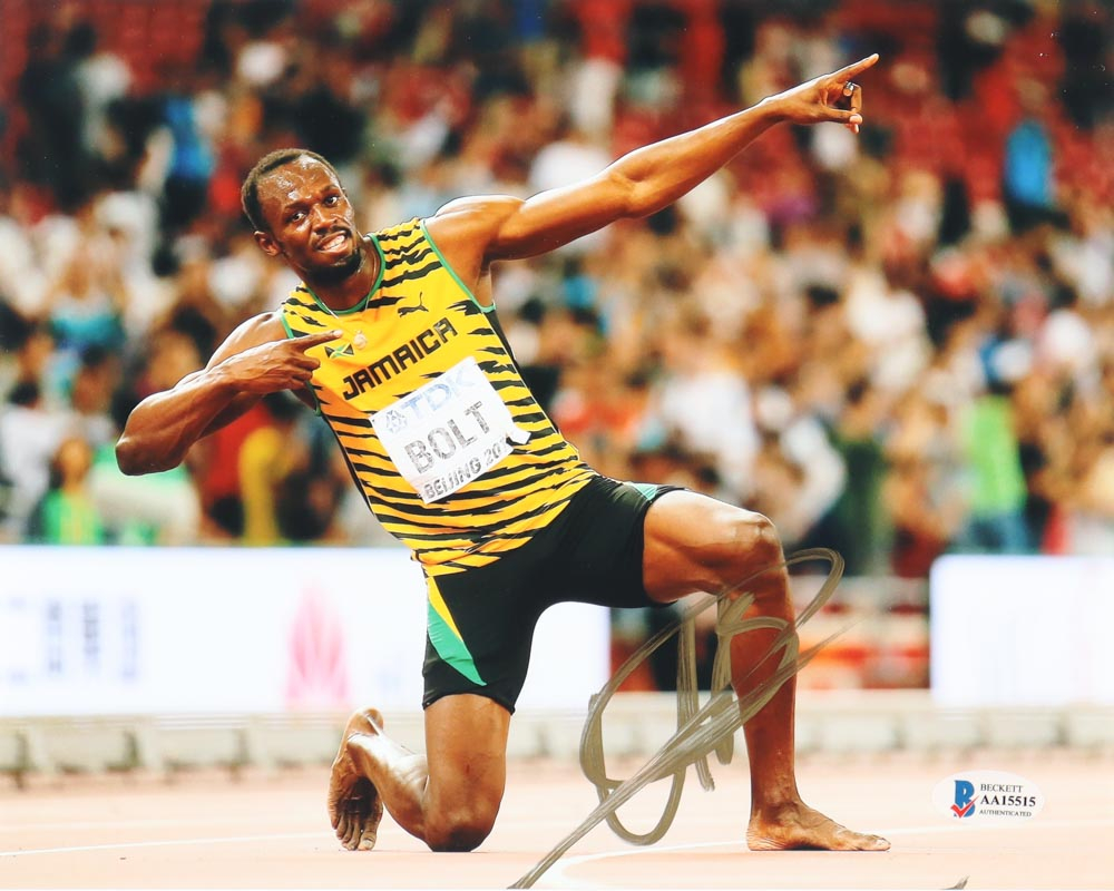 Usain Bolt Signed Team Jamaica 8x10 Photo (Beckett) | Pristine Auction