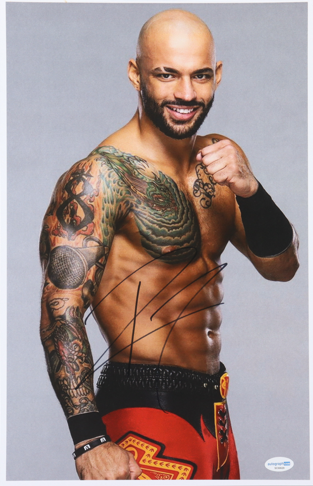 WWE Ricochet Signed 11x17 WWE Photo (ACOA) | Pristine Auction