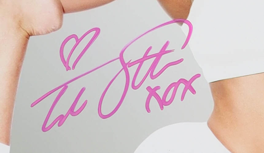 Trish Stratus Signed WWE 11x14 Photo (JSA) | Pristine Auction