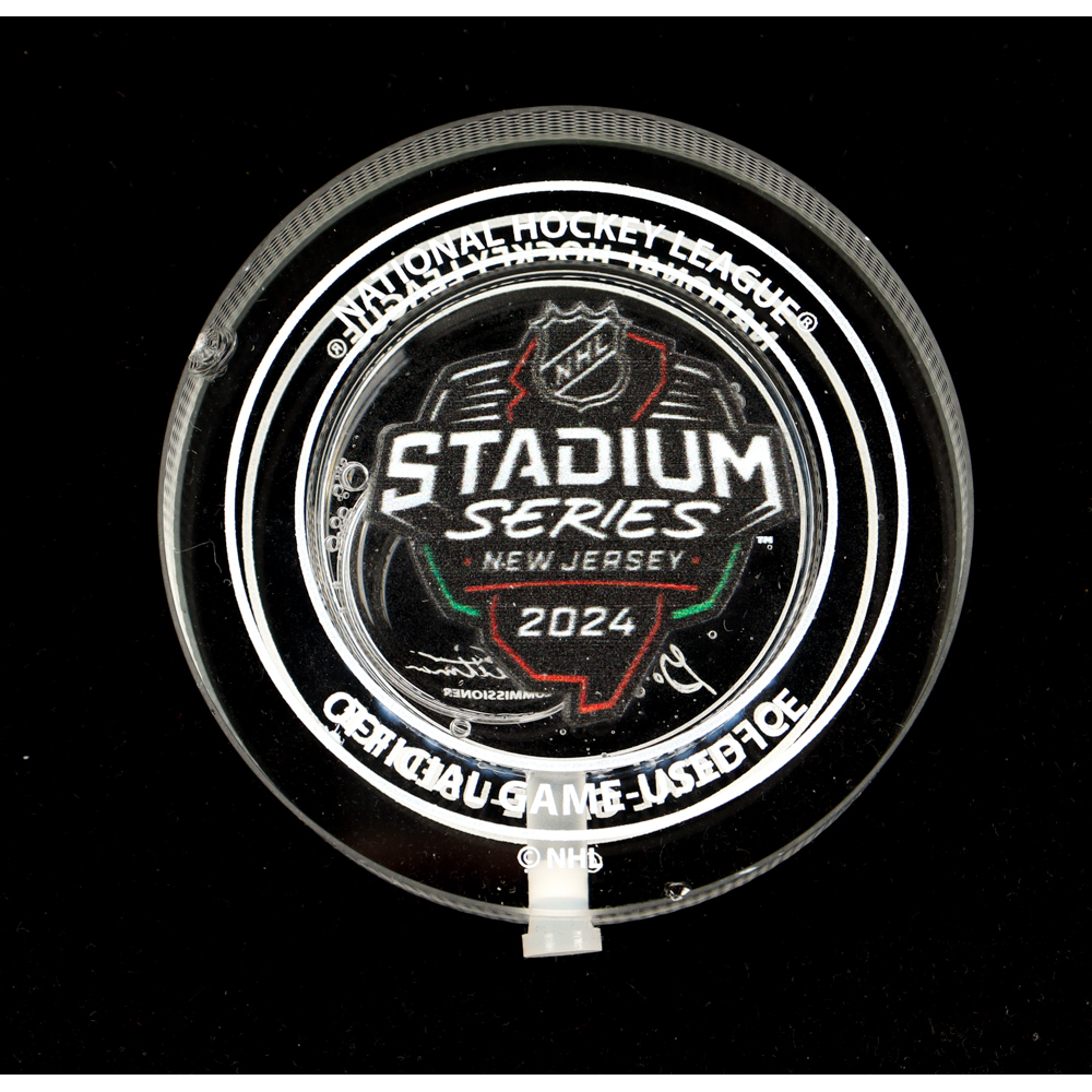 2024 Stadium Series Game-Used Ice in Crystal Hockey Puck | Pristine Auction