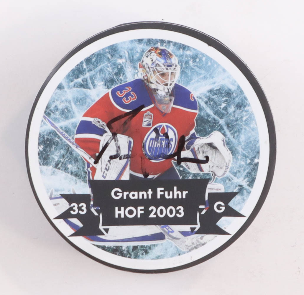 Grant Fuhr Signed Hall of Fame Logo Hockey Puck (AWM) | Pristine Auction